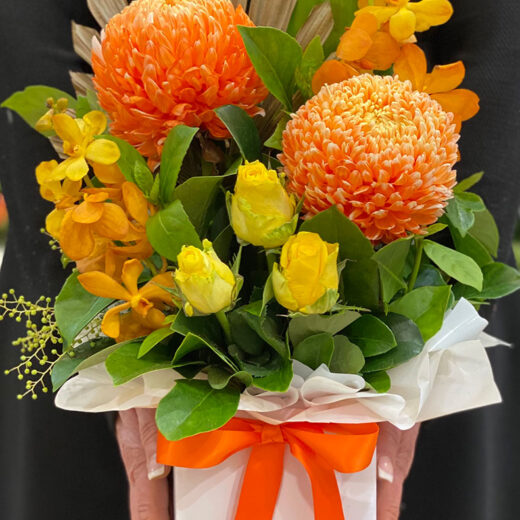 A beautiful floral arrangement presented in a box - The Blu Tulip » The ...
